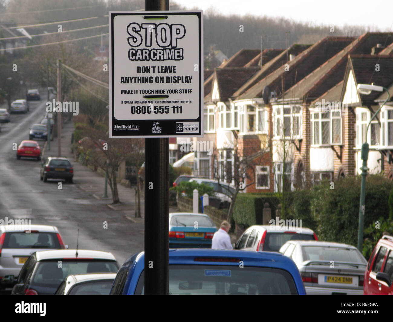 Stop Car Crime Sign on suburban street Stock Photo - Alamy