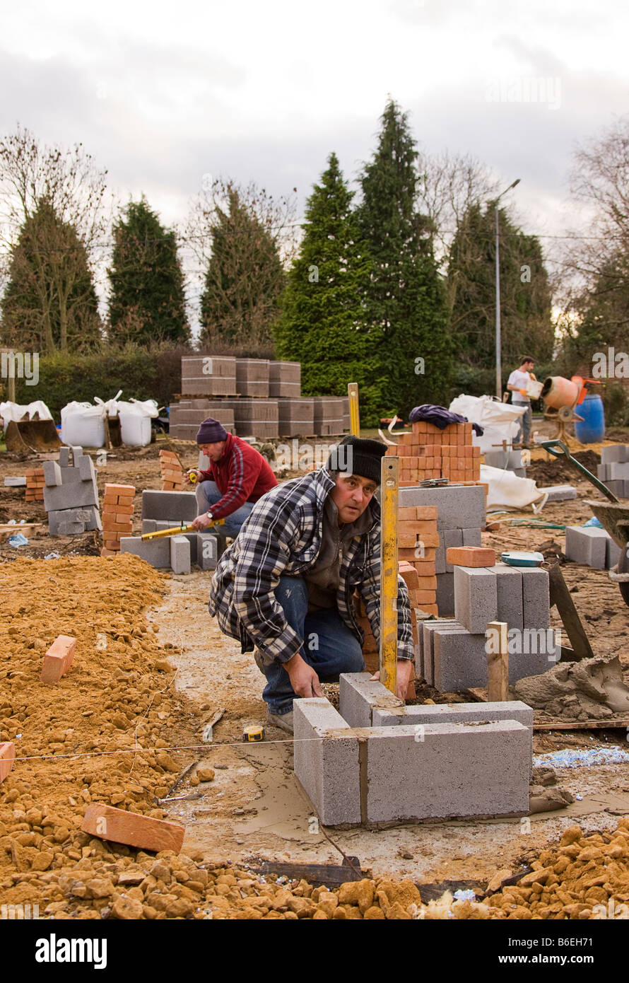 Checking that the Concrete block is vertical Stock Photo - Alamy