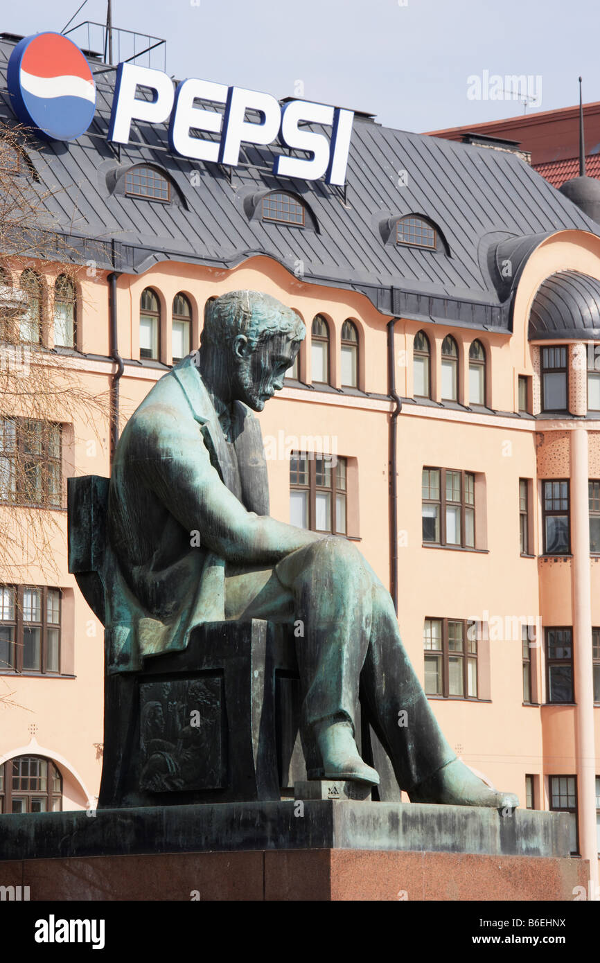Statue of Alexis Kivi in the Railway Station Square with Pepsi ...