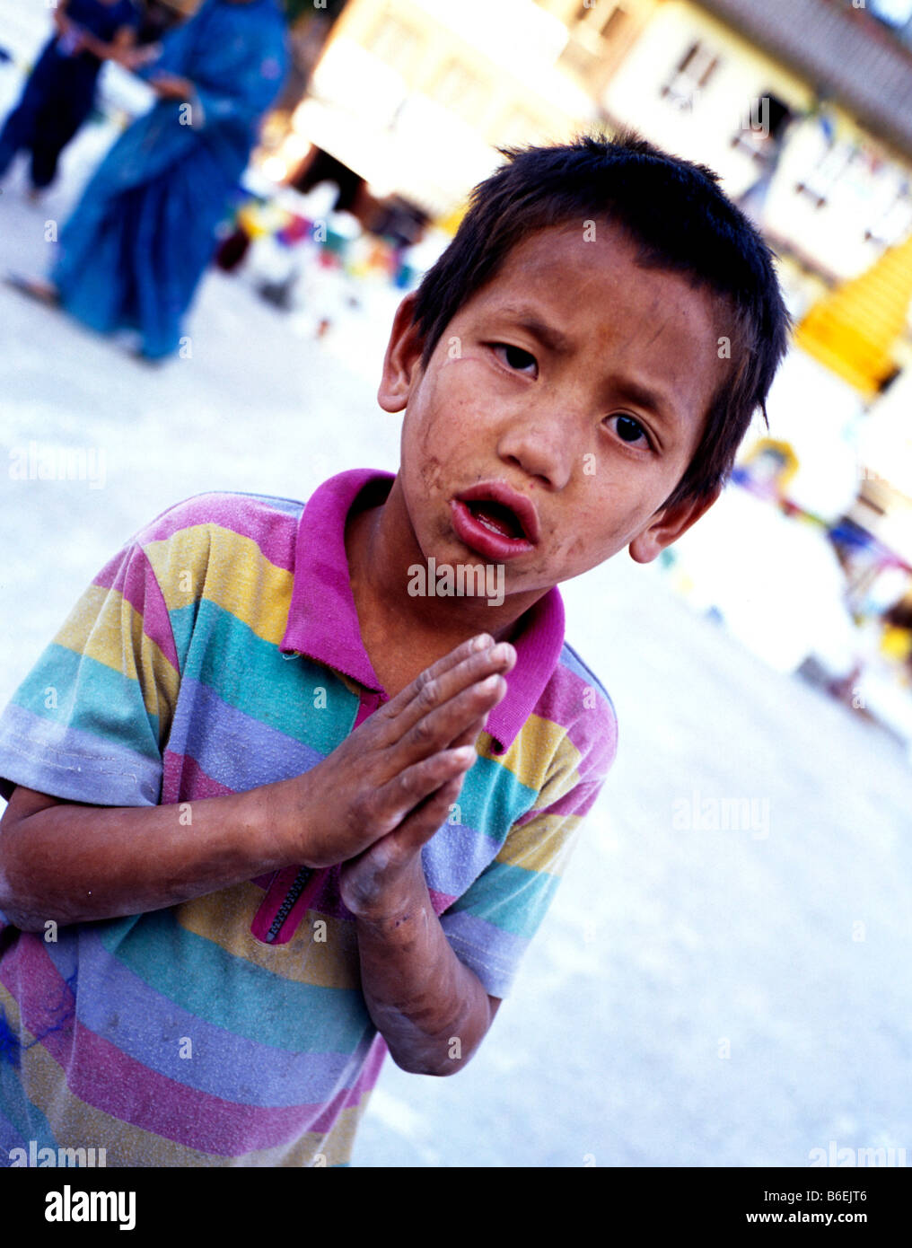 Indian boy begging, Delhi, India Stock Photo - Alamy