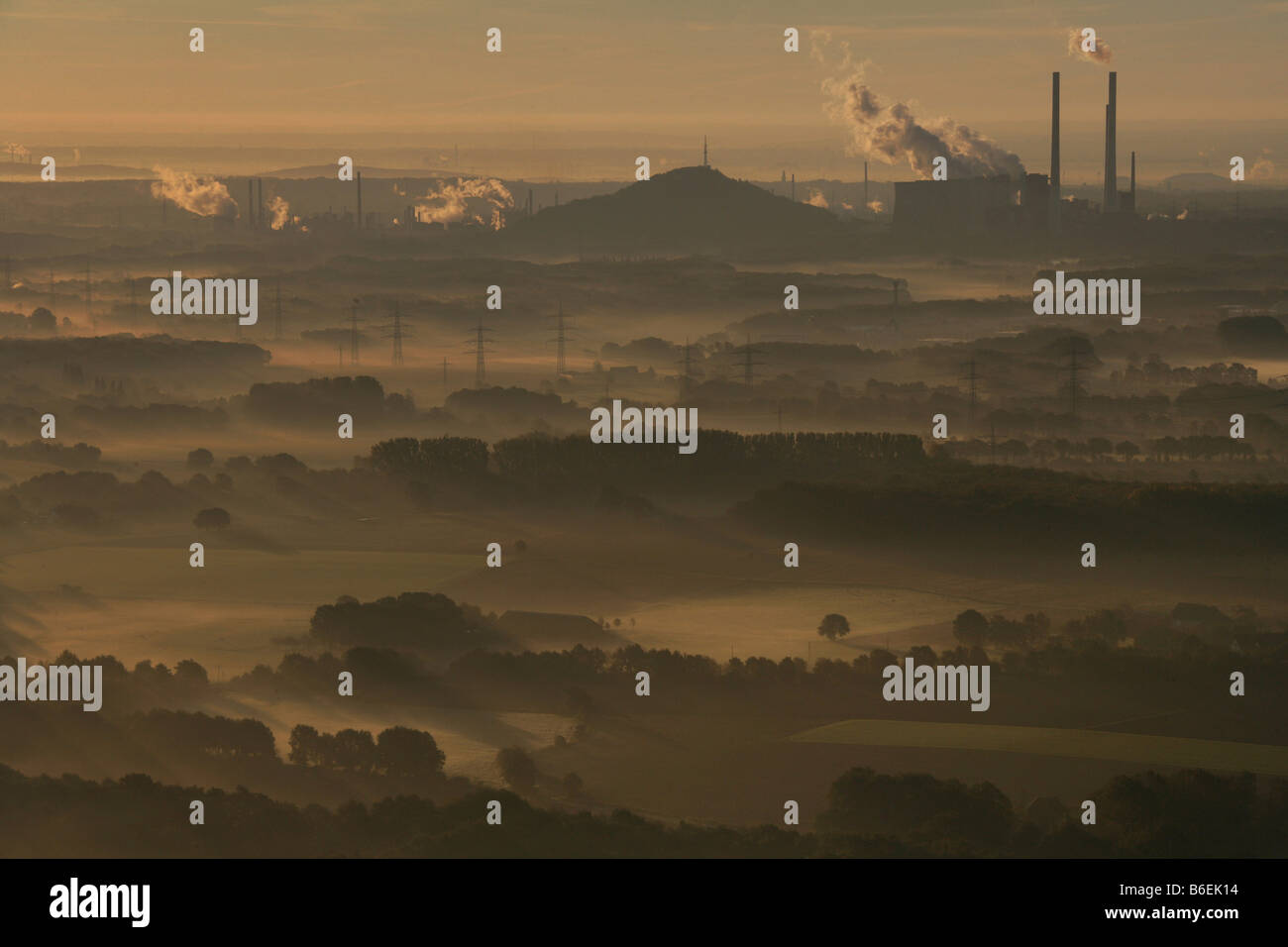 Sunrise over the VEBA-Oel AG company and the Scholven power station ...