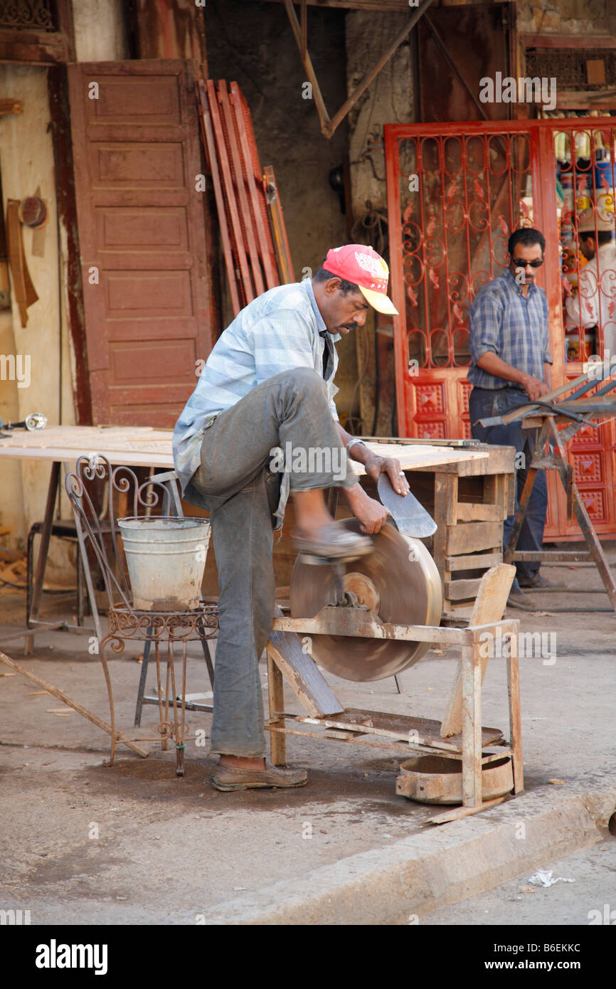 Man sharpening tools, market, medina, Meknes, Morocco Stock Photo - Alamy