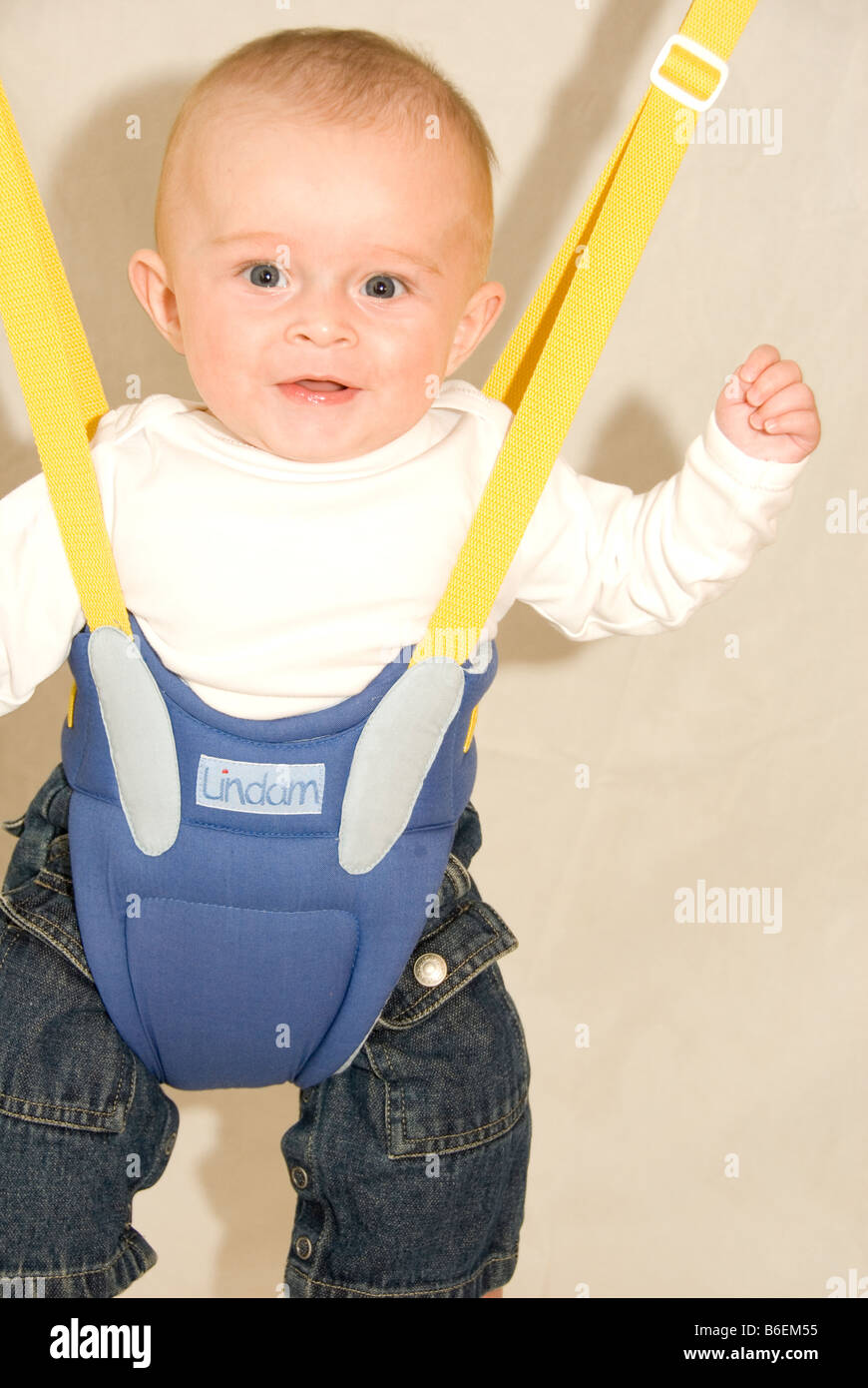 Baby Boy Joshua Kailas Hudson Playing in Baby Bouncer Cut Out on White ...