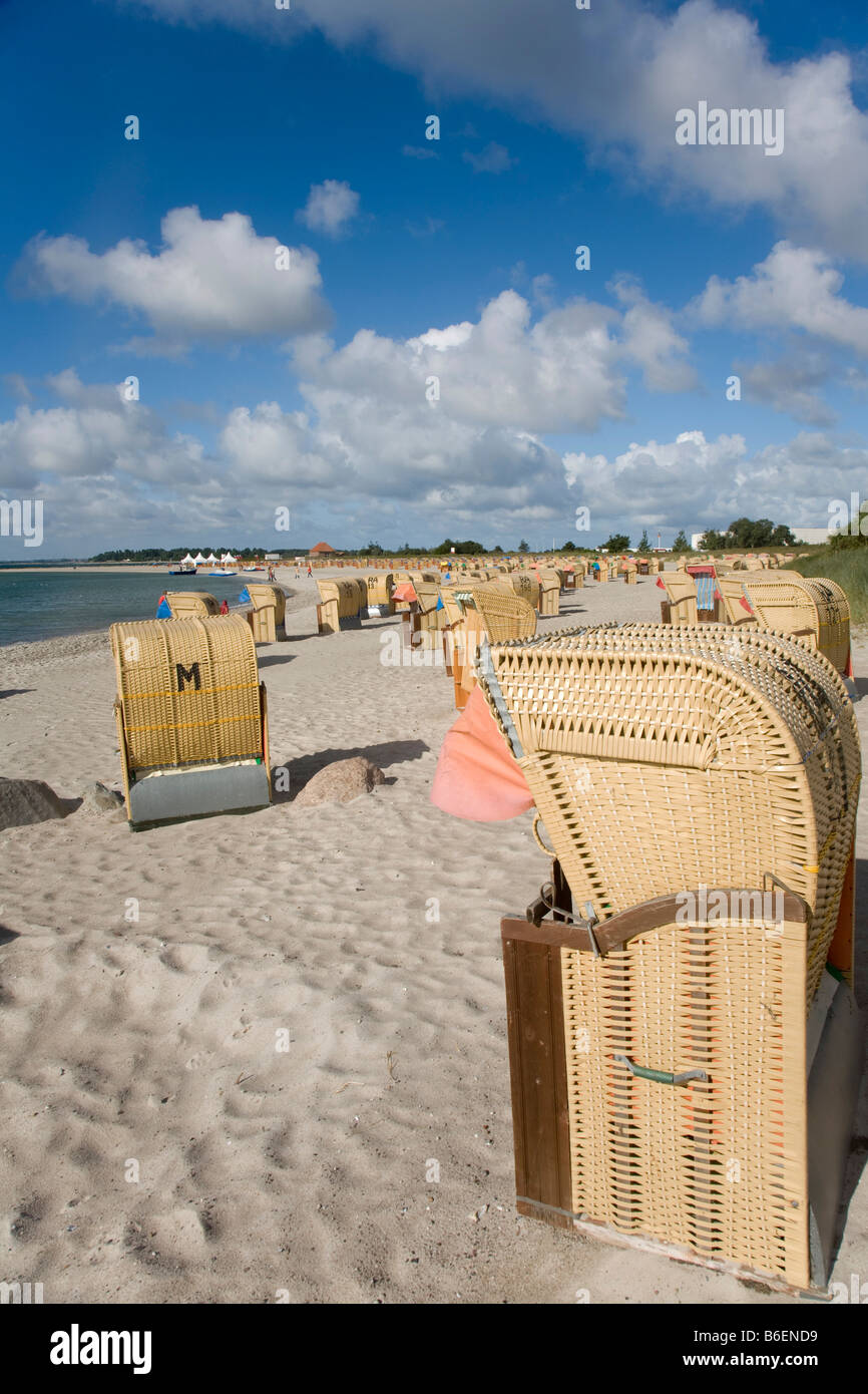 Roofed wicker beach chairs on the Baltic Sea beach of Burgtiefe ...