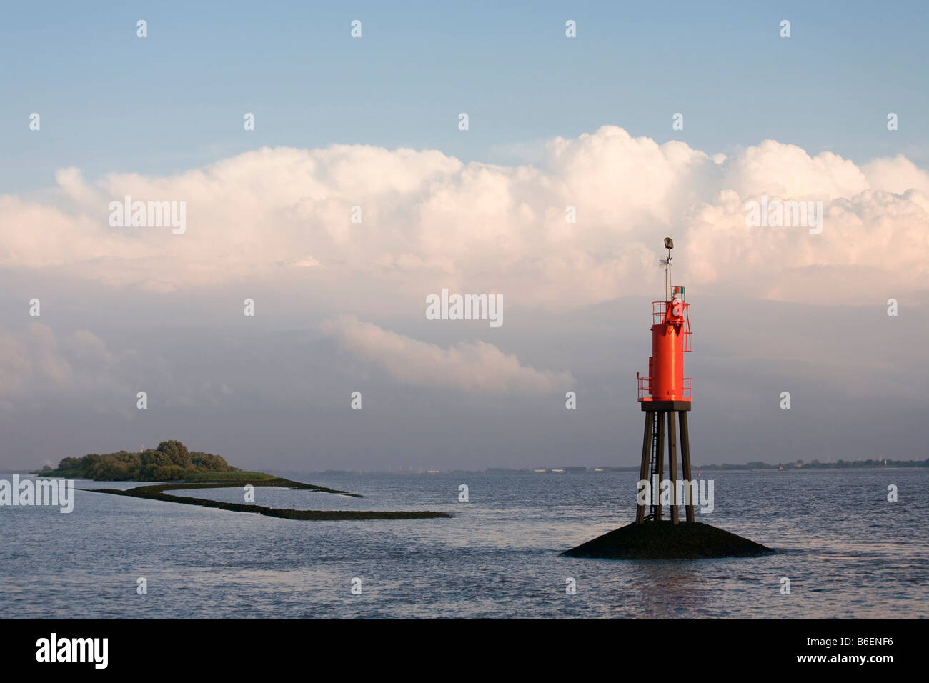 Maritime navigation mark in front of an island on the Elbe River ...