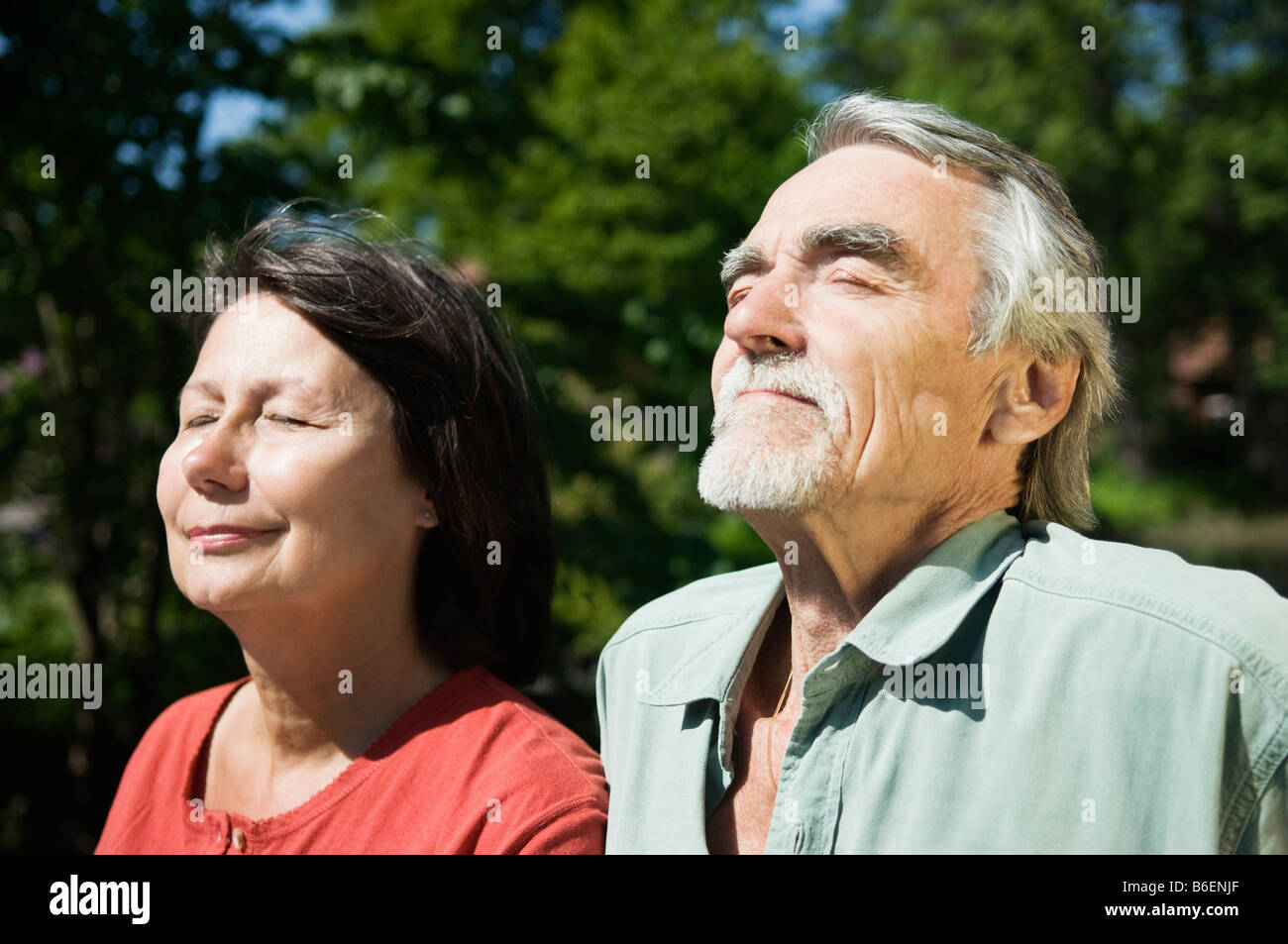 Old couple sunbathing hi-res stock photography and images - Alamy