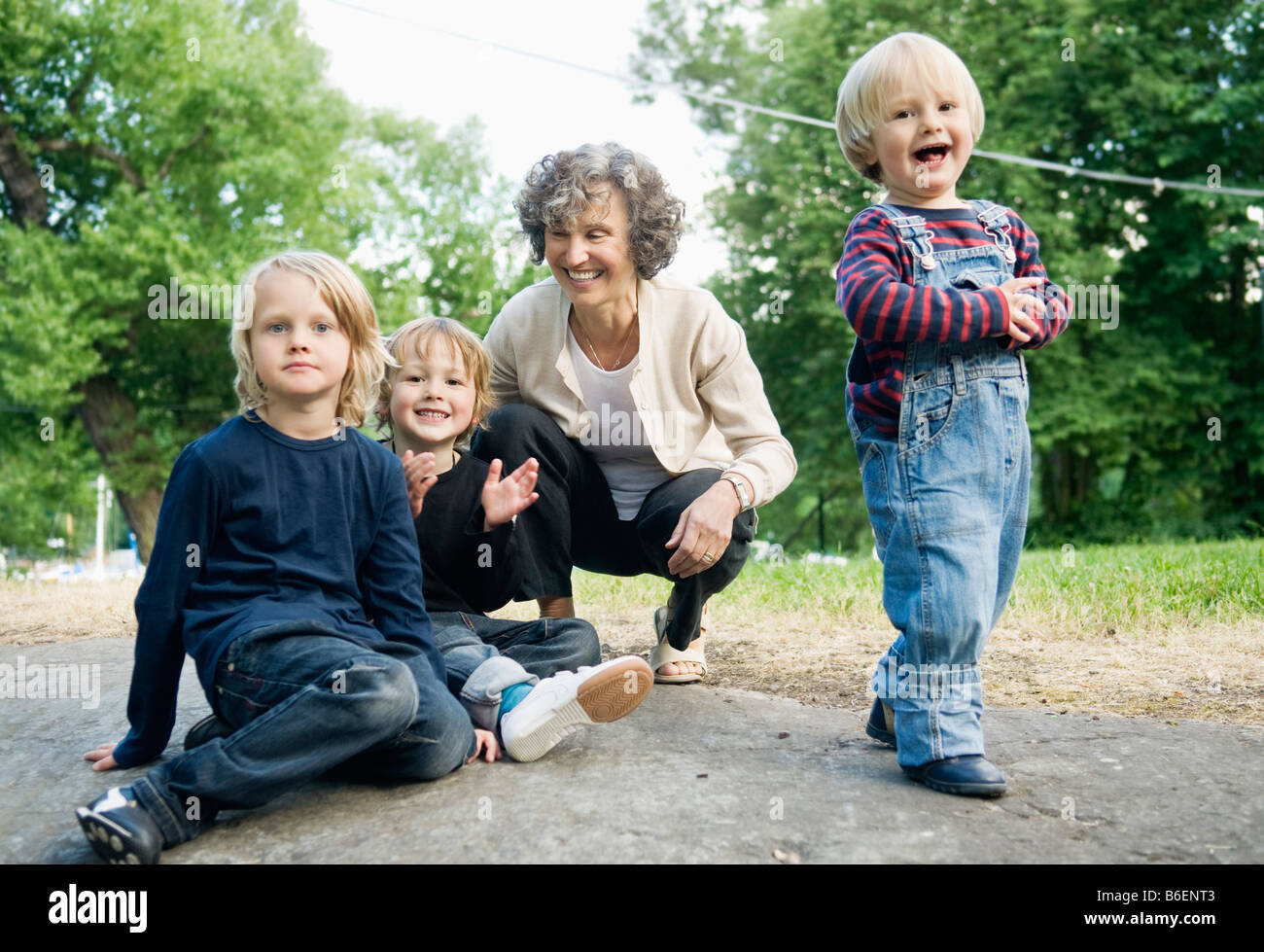 Woman with children Stock Photo - Alamy
