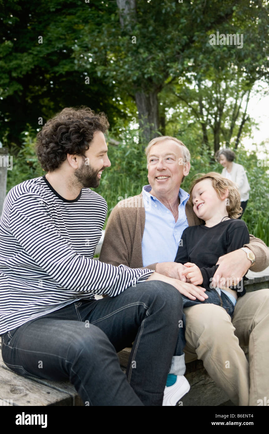 Men with child Stock Photo - Alamy