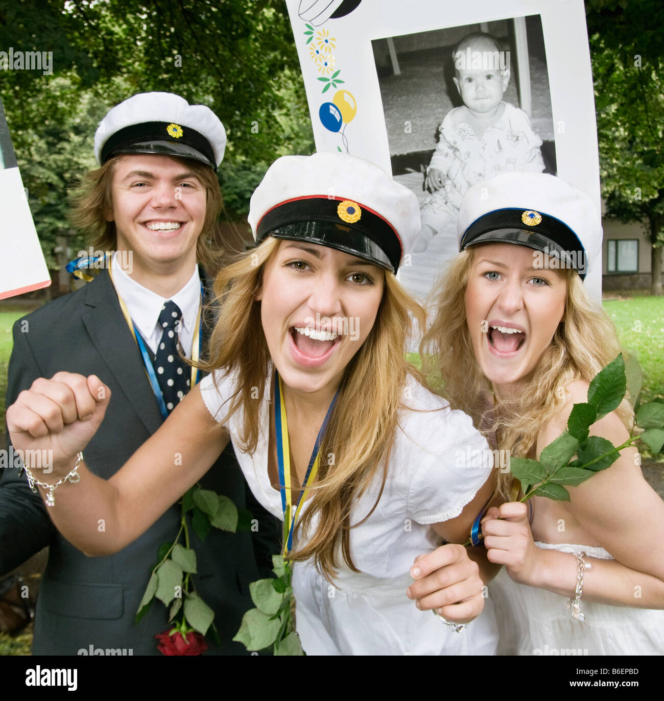 Students with sign Stock Photo - Alamy