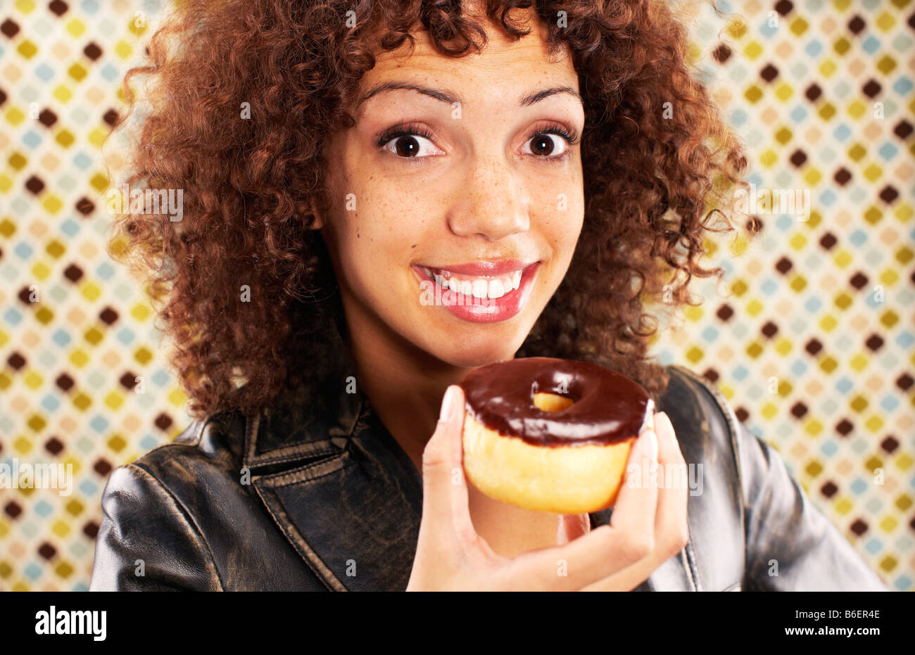 Portrait of an African American woman, wearing a leather jacket and ...