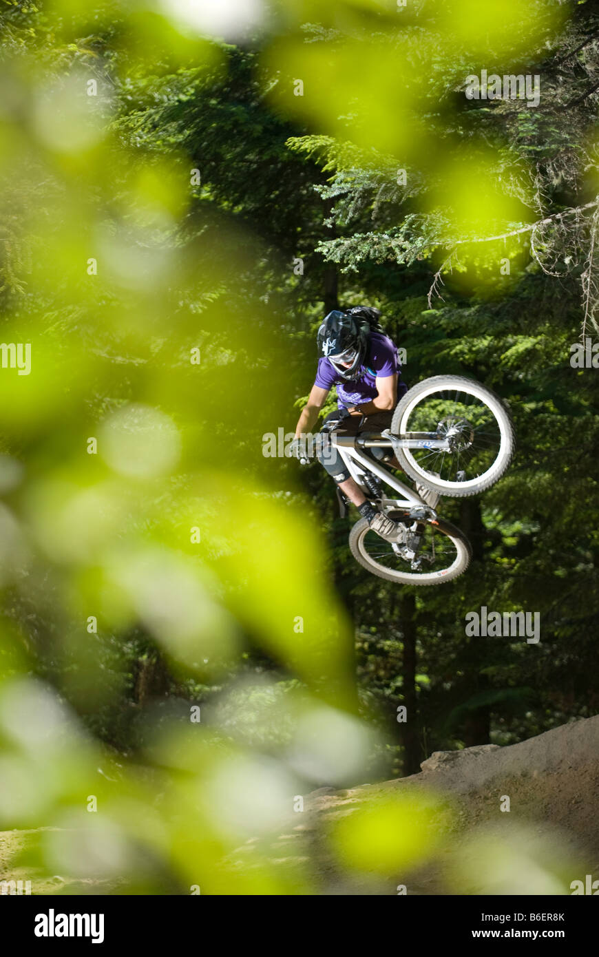 Mountain biker doing a table Stock Photo - Alamy