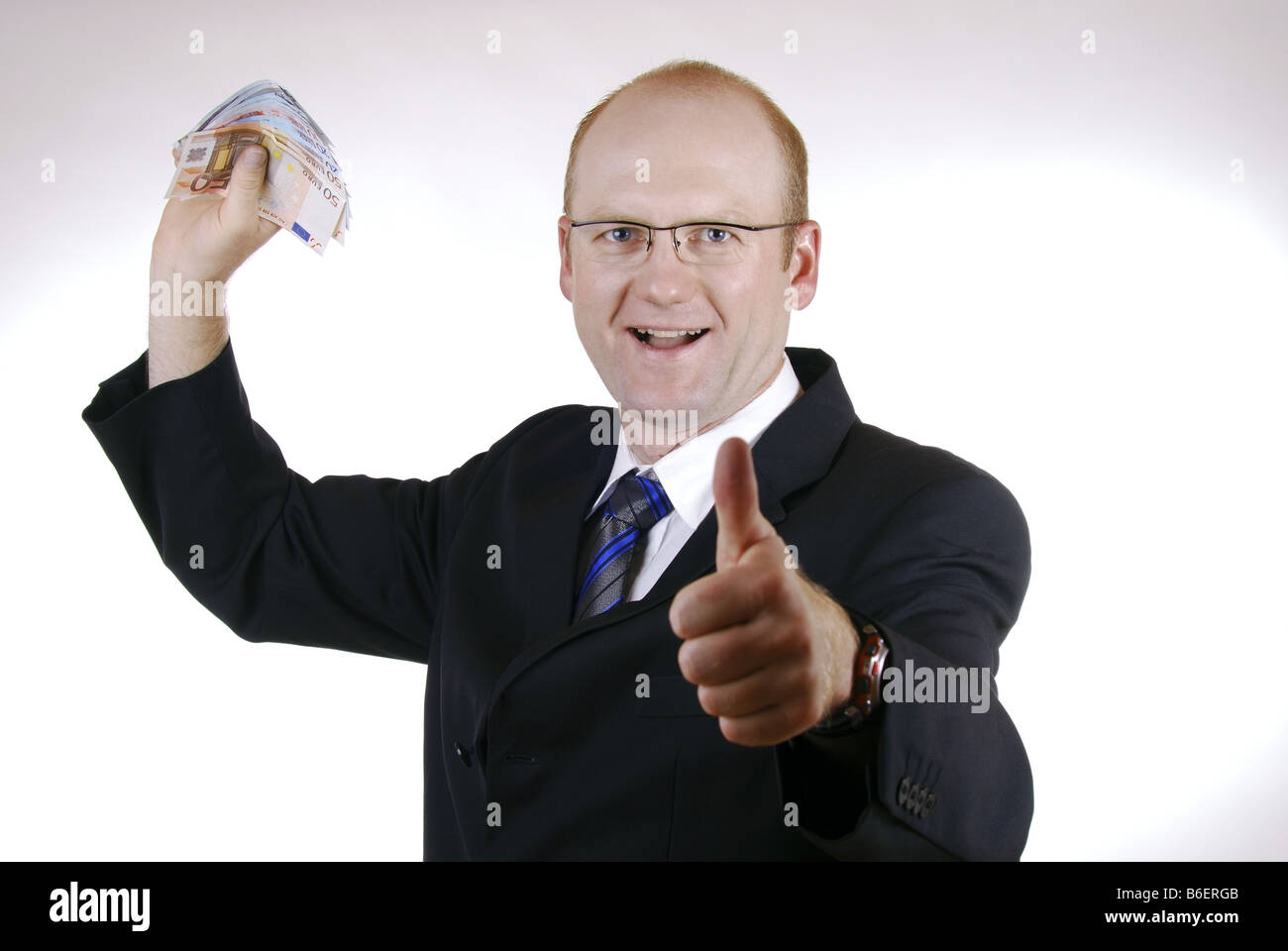 man with euro bank notes Stock Photo - Alamy