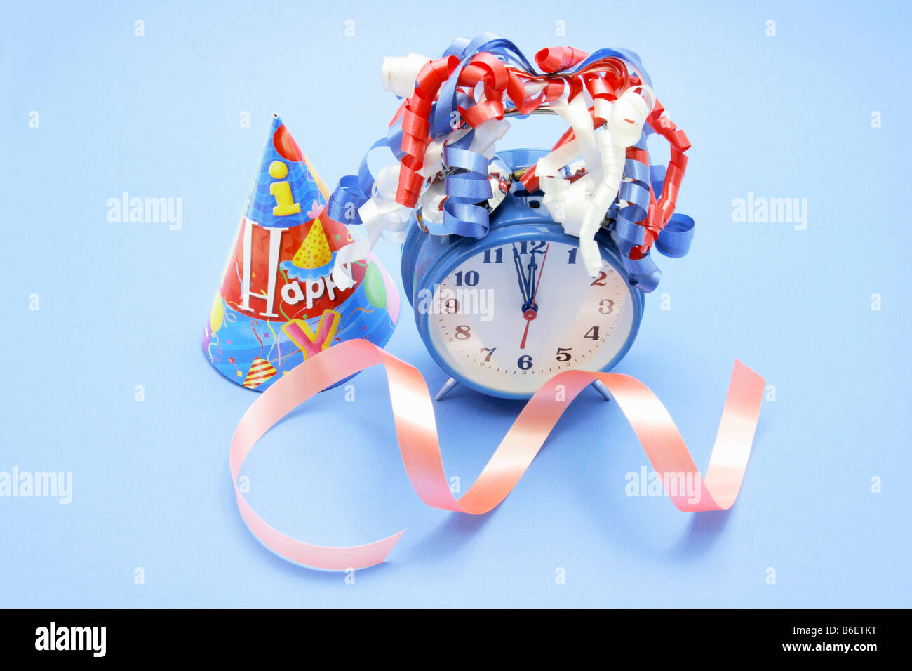 Alarm Clock and Party Favors Stock Photo - Alamy
