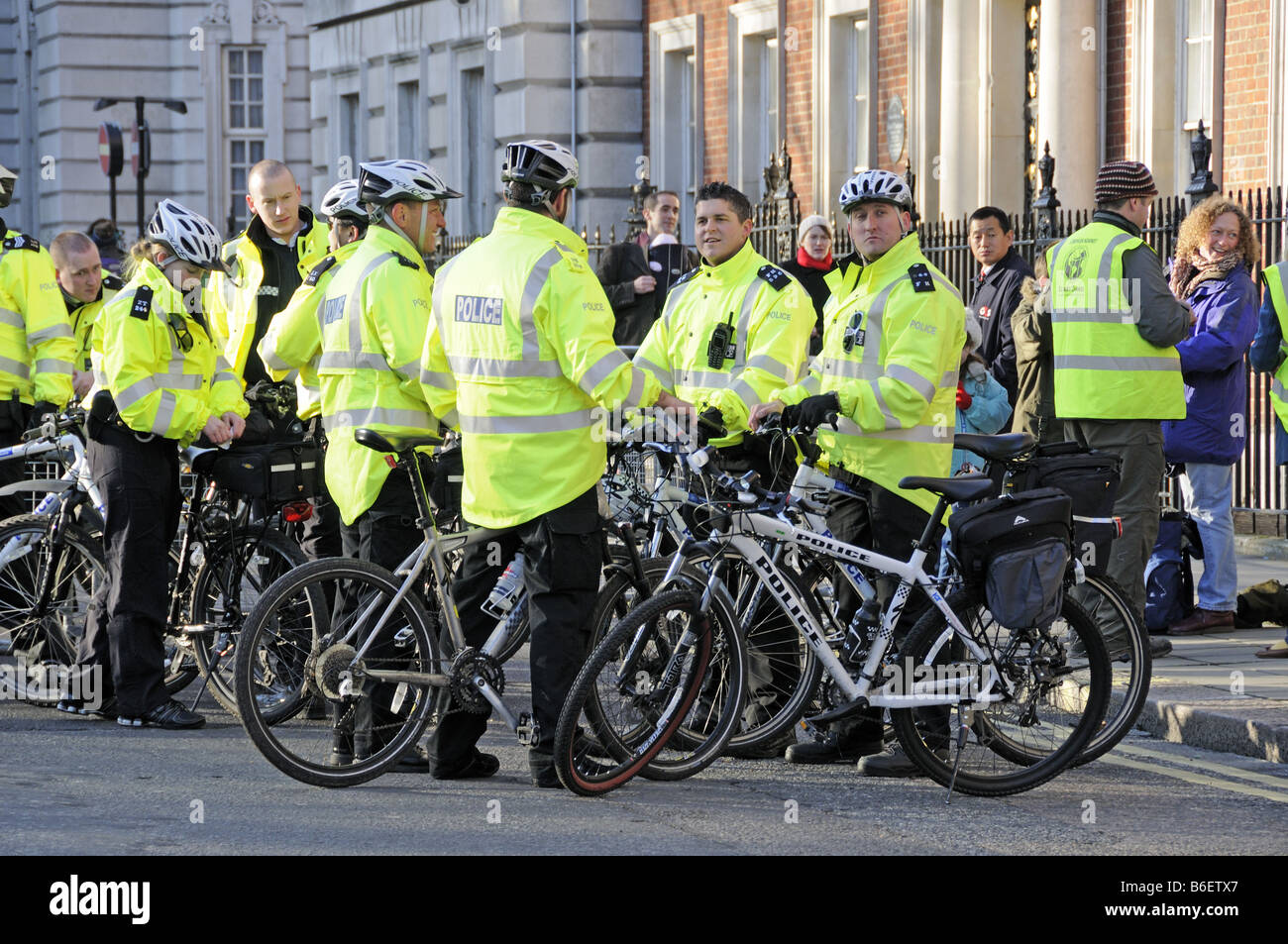 Metropolitan police on bikes at climate change demonstration London ...