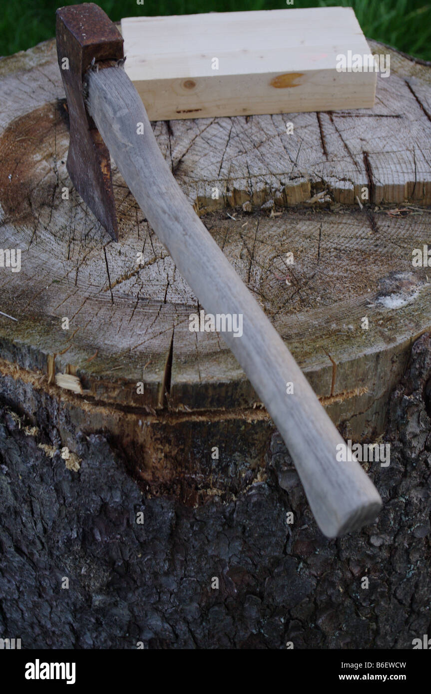 a axe on a stump Stock Photo - Alamy