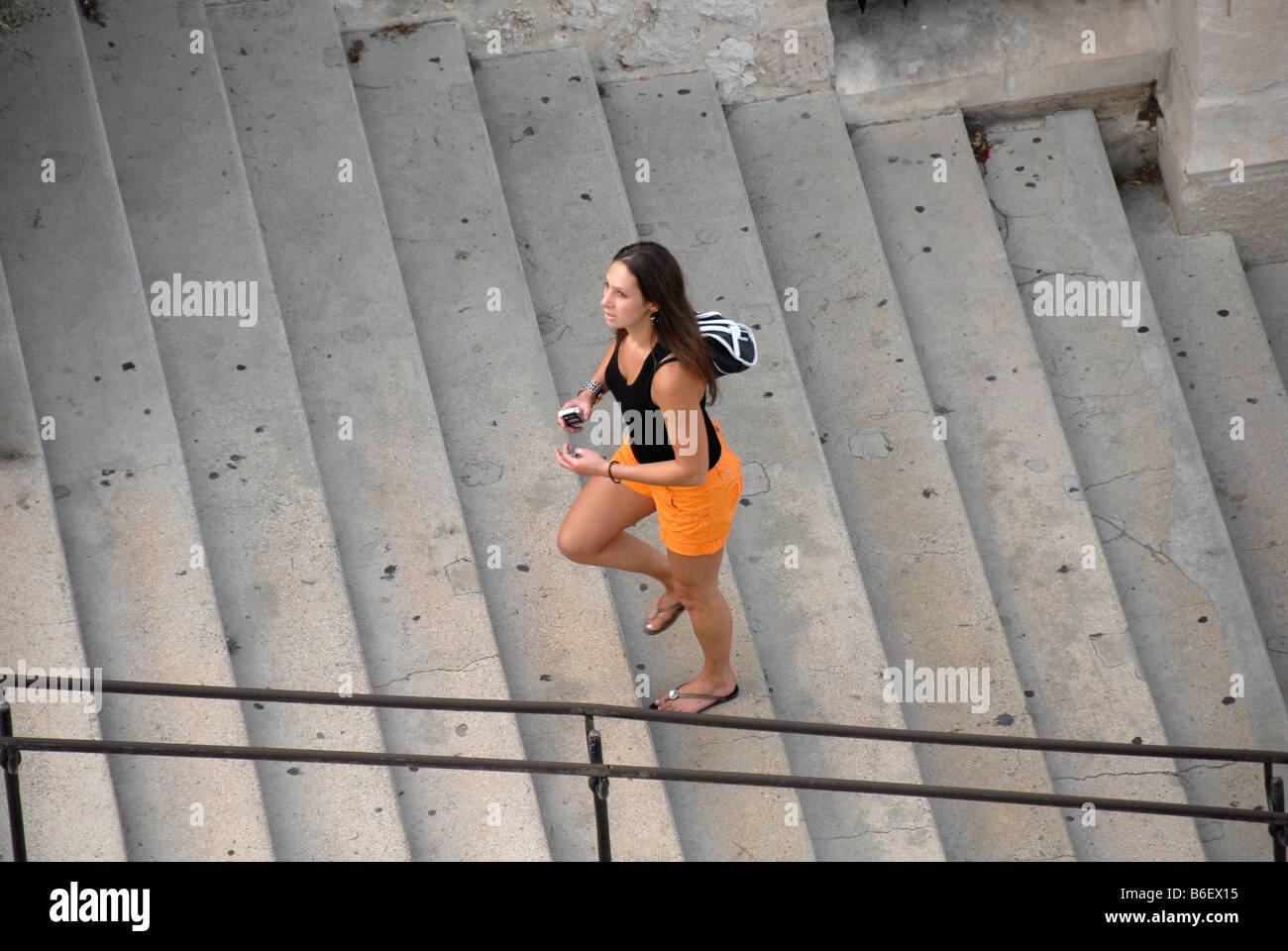 Girl walking up stairs outside hi-res stock photography and images - Alamy