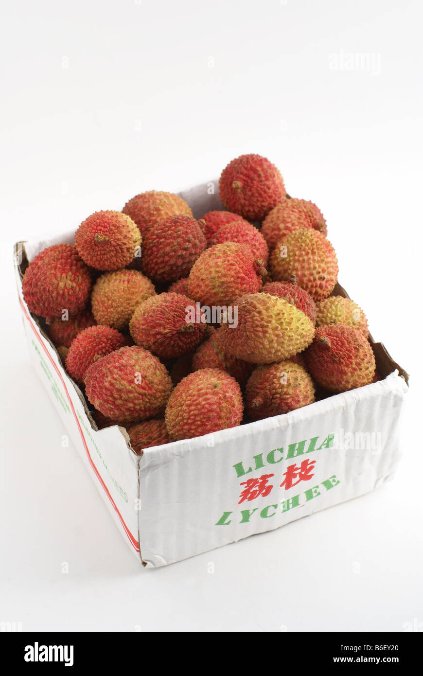 box full of lychees on a white background, cut-out Stock Photo - Alamy
