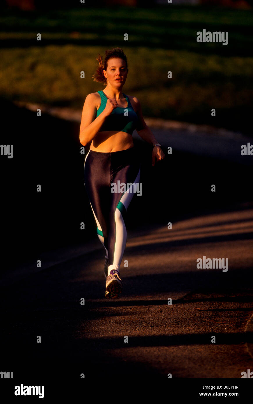Young woman running for exercise Stock Photo - Alamy