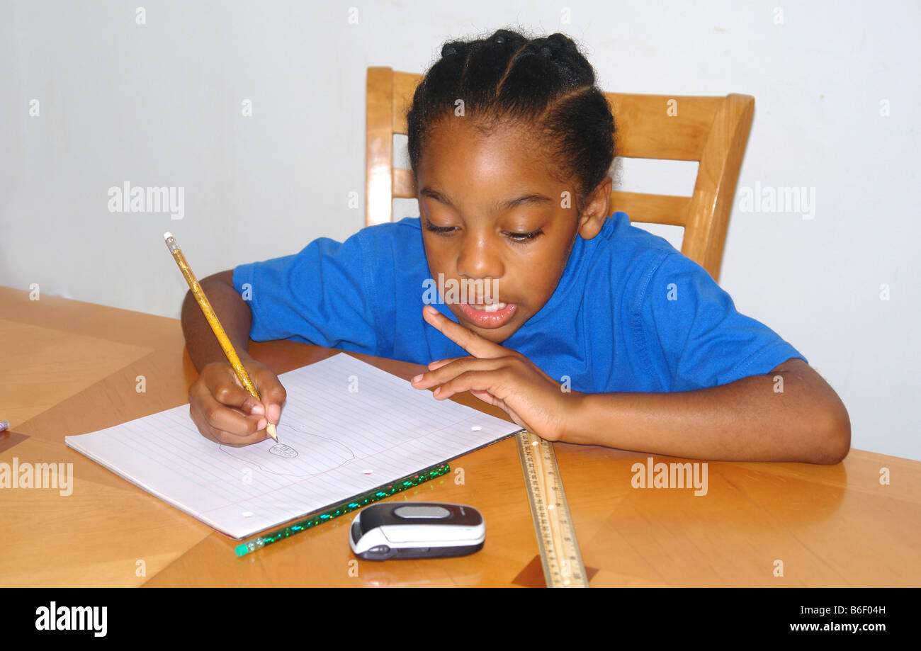 Student doing homework Stock Photo - Alamy