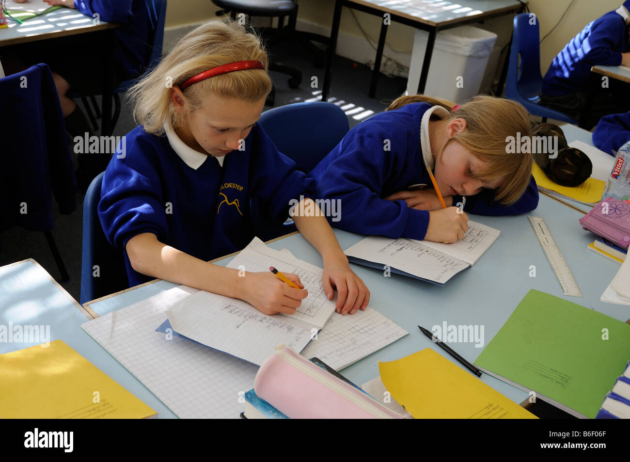 Primary school children working in classroom Stock Photo - Alamy