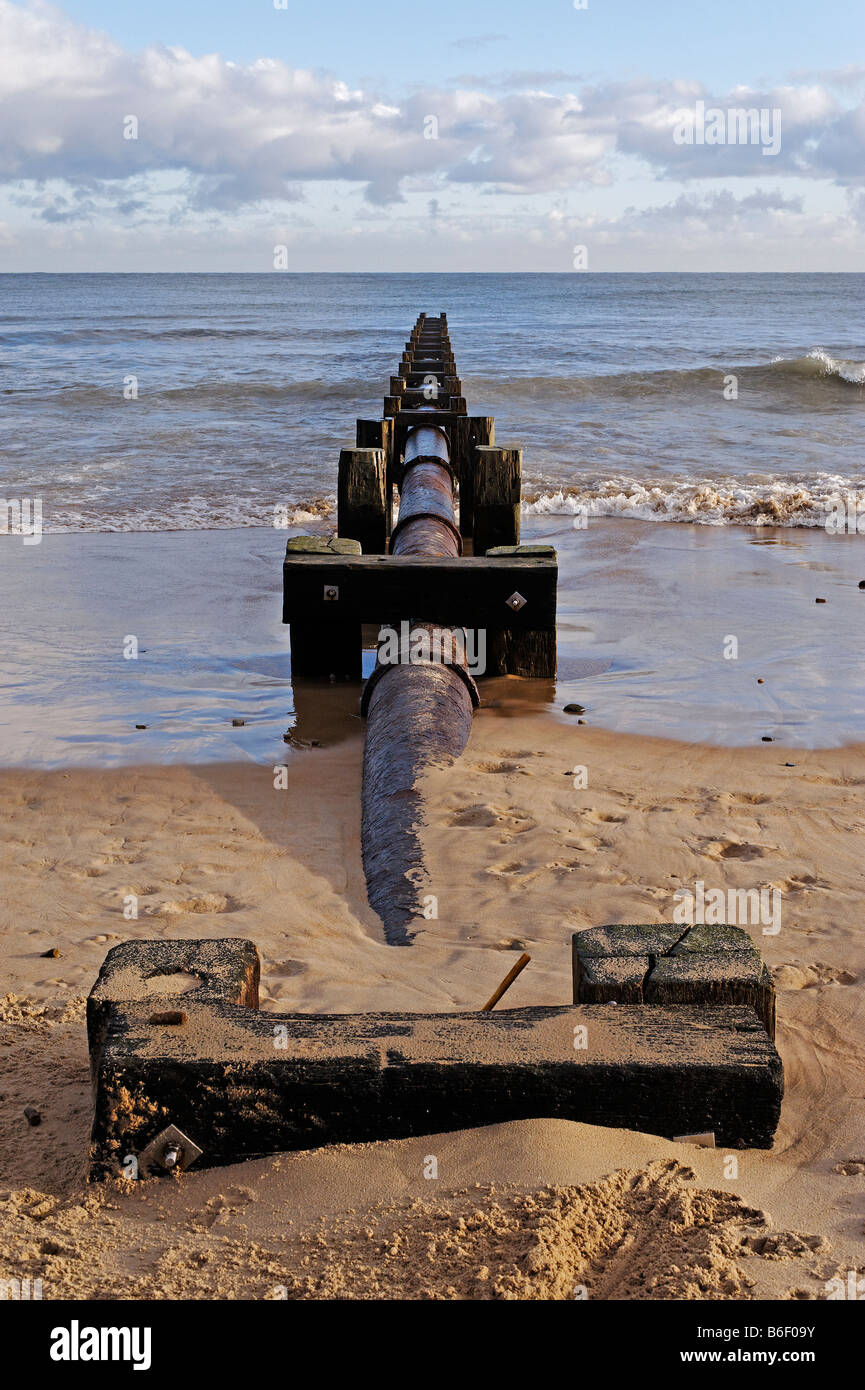 pipeline running from beach into the sea Stock Photo - Alamy