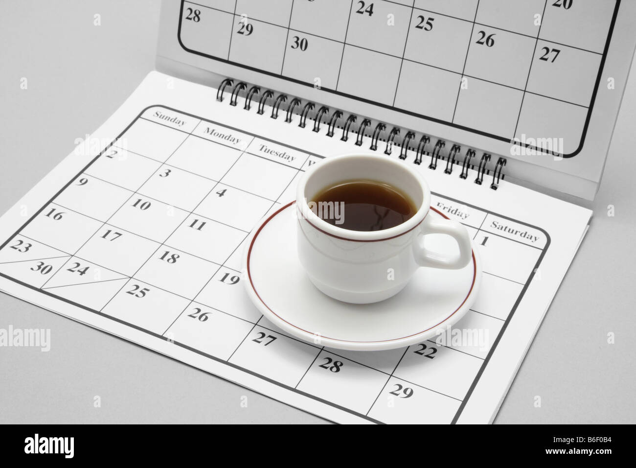 Coffee Cup on Calendar Stock Photo - Alamy