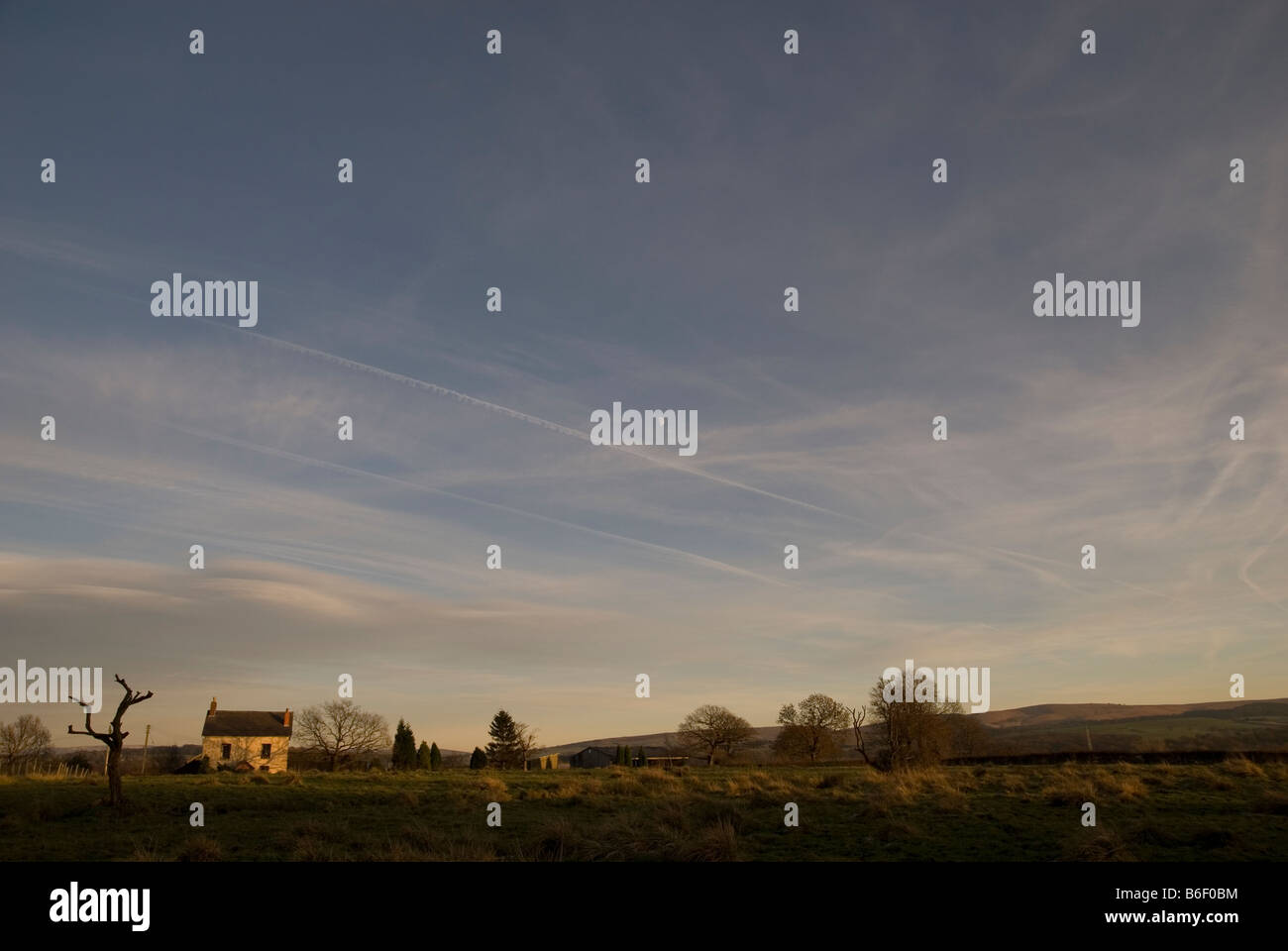 Lone house on a hill Stock Photo - Alamy