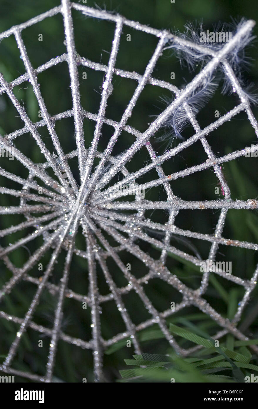 Silver spider's web Christmas tree decoration Stock Photo - Alamy