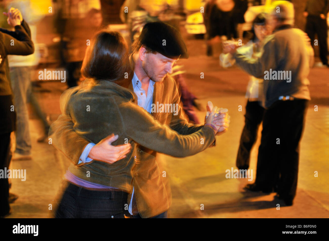 Tango dancing partners at a tango event, Milonga, on the Plaza Dorrego ...