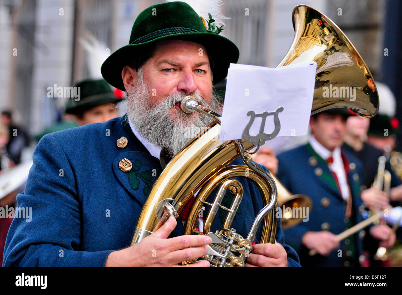 Musician in garb at the Oktoberfest's traditional costume procession ...