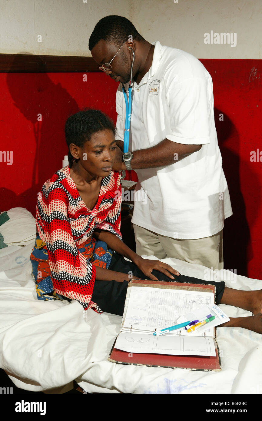 Examination and treatment of an AIDS/HIV patient in a hospital in ...