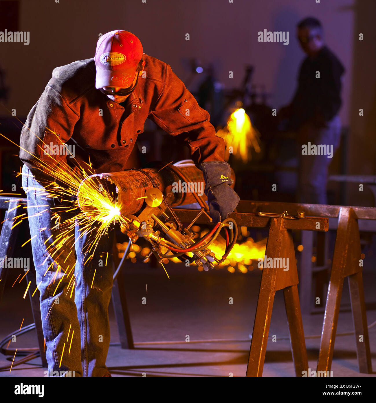 young man welding Stock Photo - Alamy