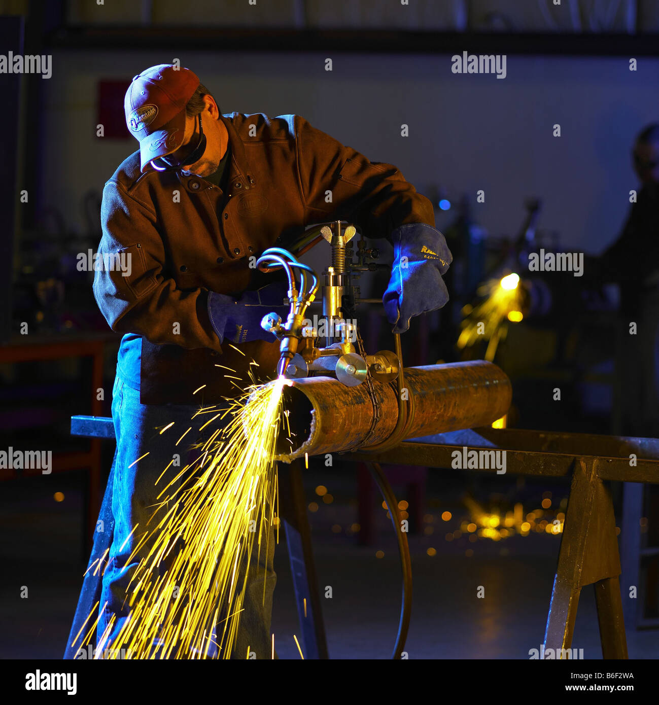 young man welding Stock Photo - Alamy