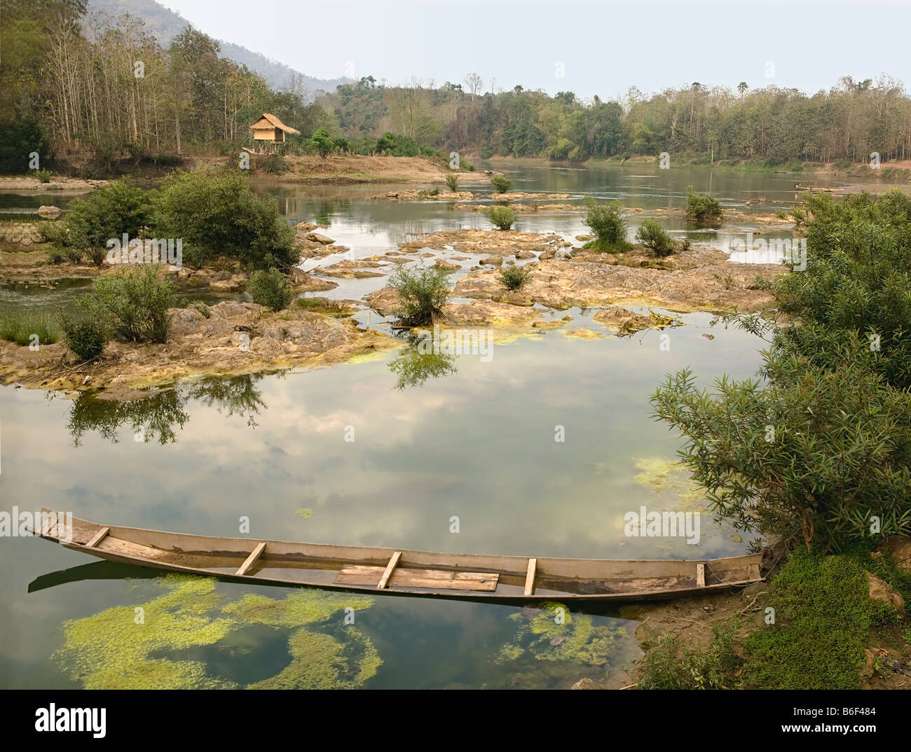 Mossy River in Luang Prabang Laos with Dugout Canoe & Traditional Home ...