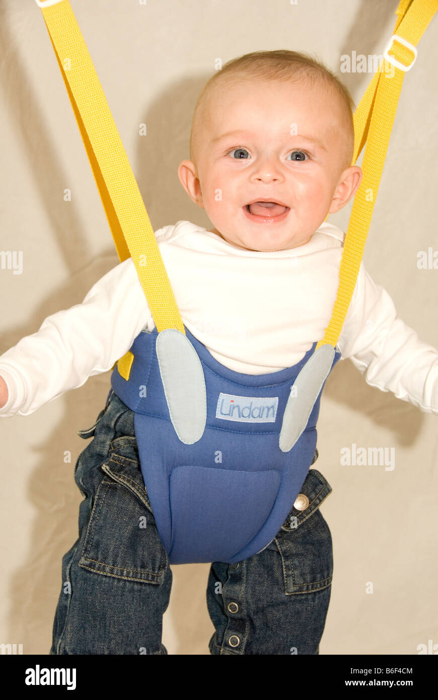Baby Boy Joshua Kailas Hudson Playing in Baby Bouncer Cut Out on White ...