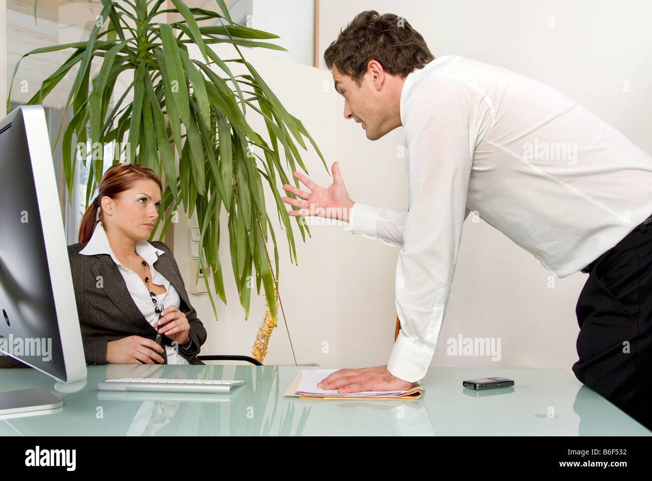 conflict in office Stock Photo - Alamy
