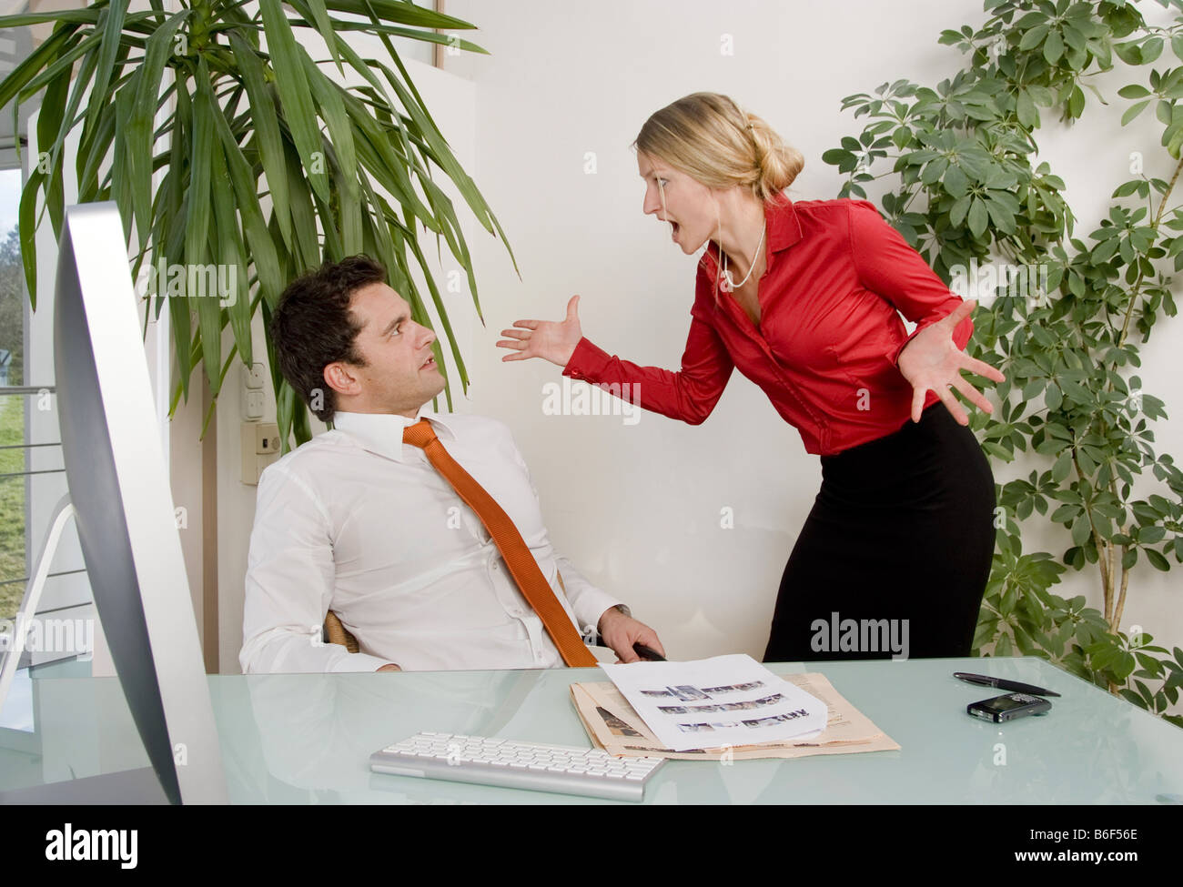 conflict in office Stock Photo - Alamy