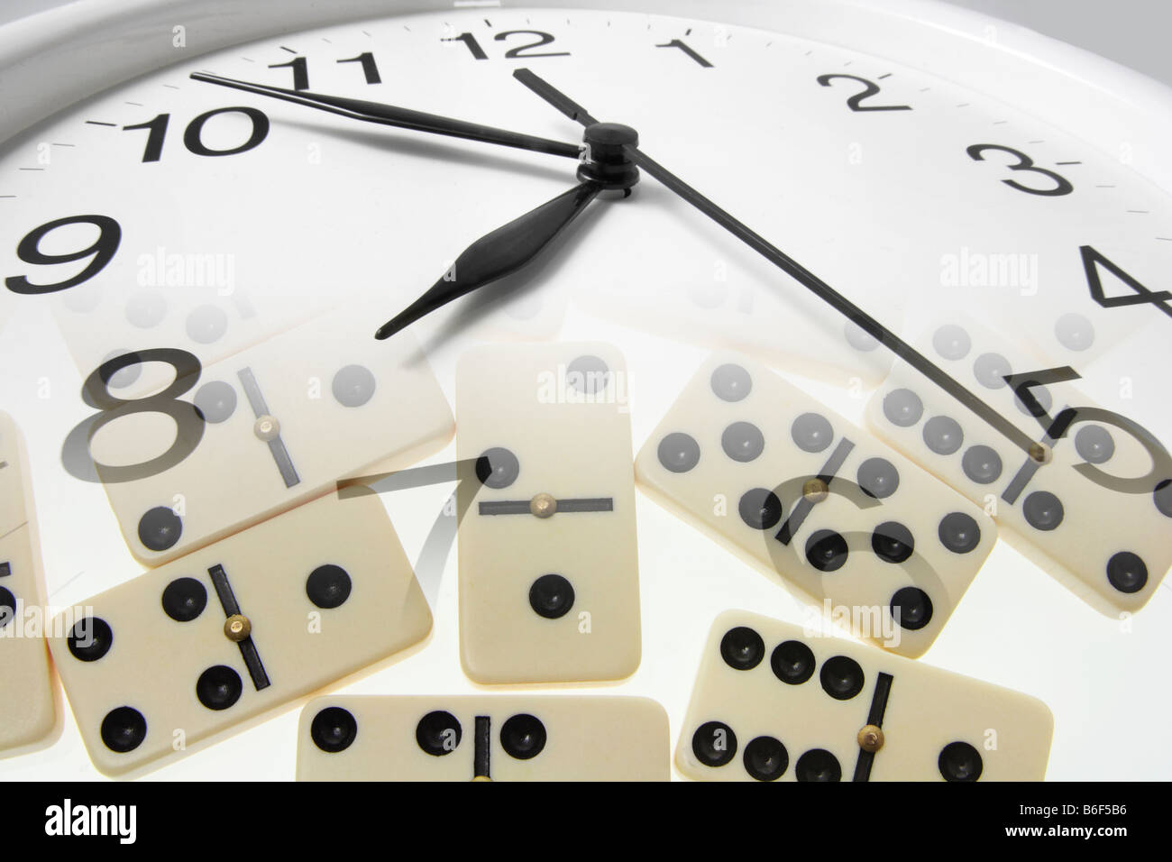 Clock and Dominoes Stock Photo - Alamy