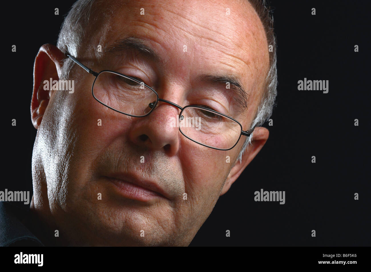 elder grey-haired man with glasses Stock Photo - Alamy