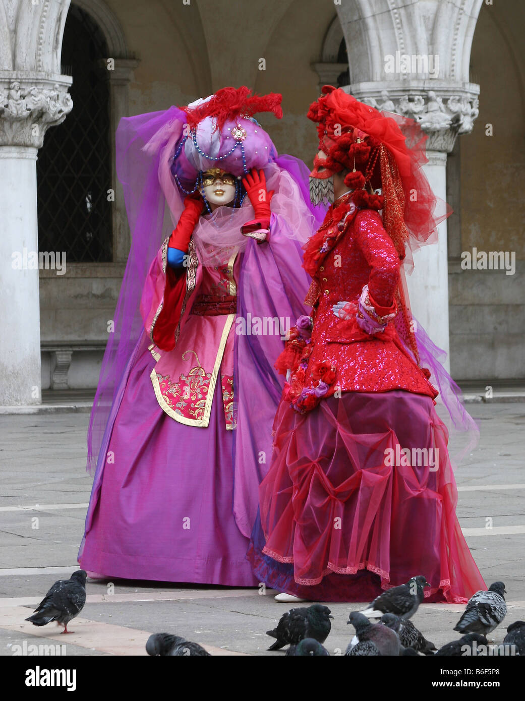 Masked women in Carnival costume Stock Photo - Alamy