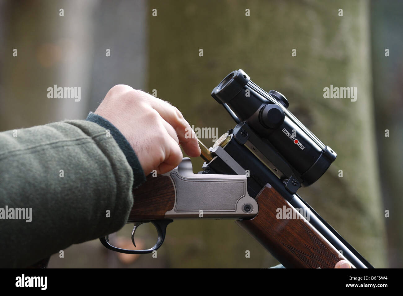 hunter loads his gun, Germany Stock Photo - Alamy