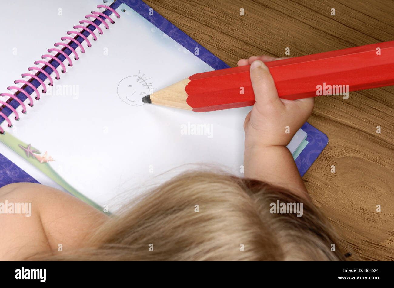 Child drawing a picture Stock Photo - Alamy
