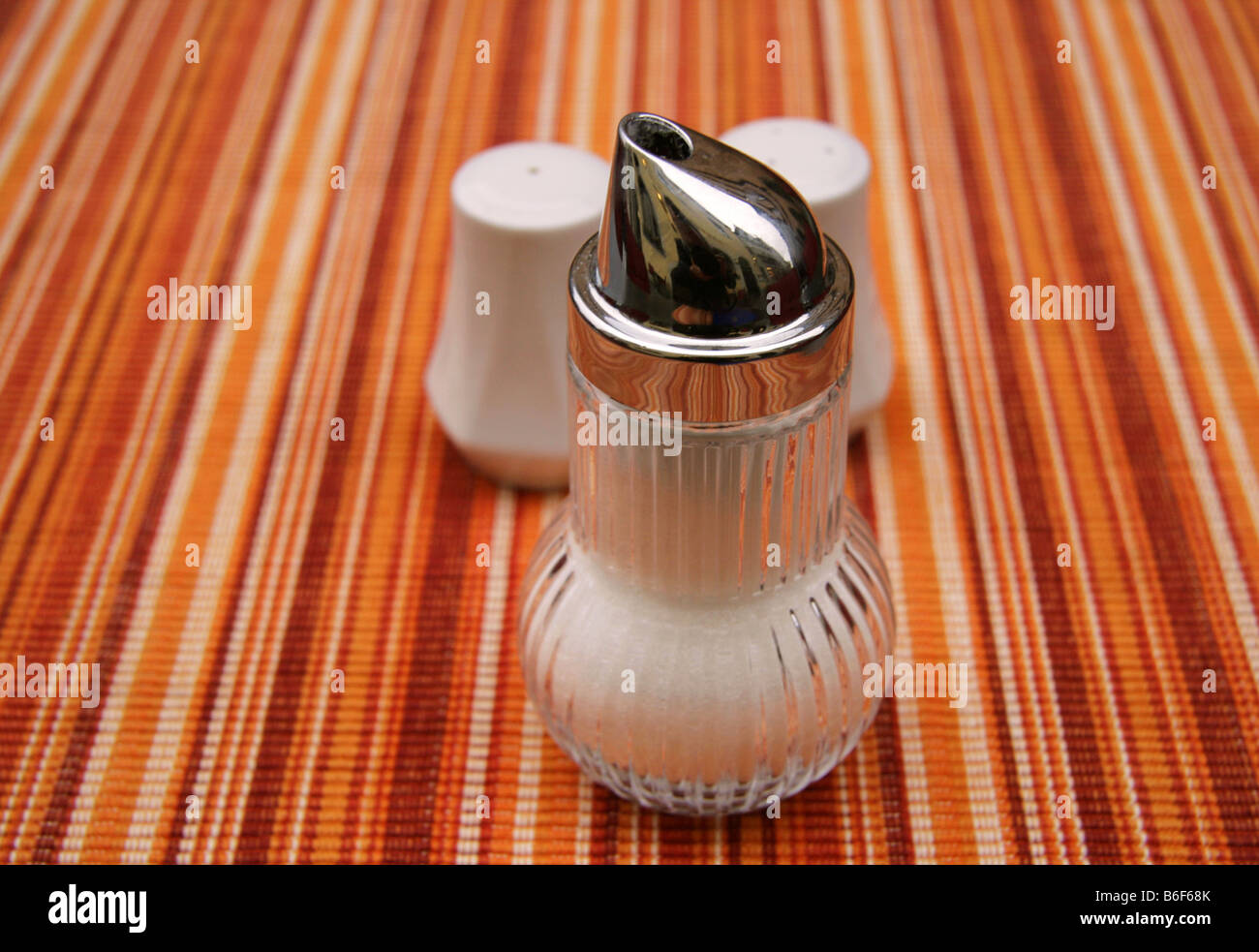 sugar sprinkler, salt and pepper shaker Stock Photo - Alamy