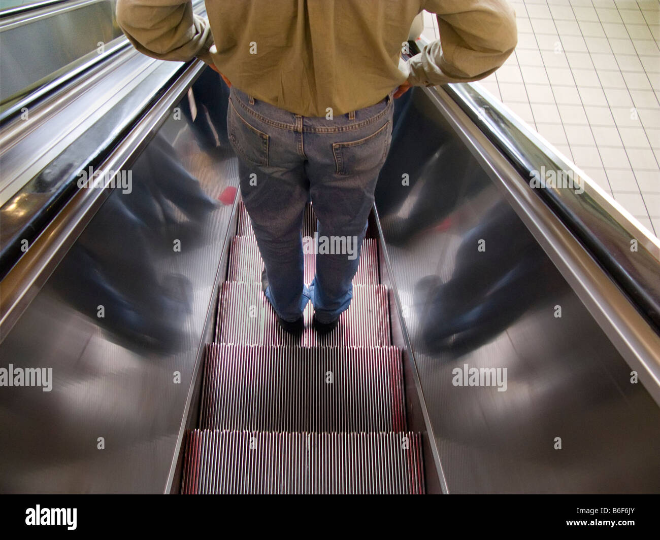 Man coming down stairs hi-res stock photography and images - Alamy