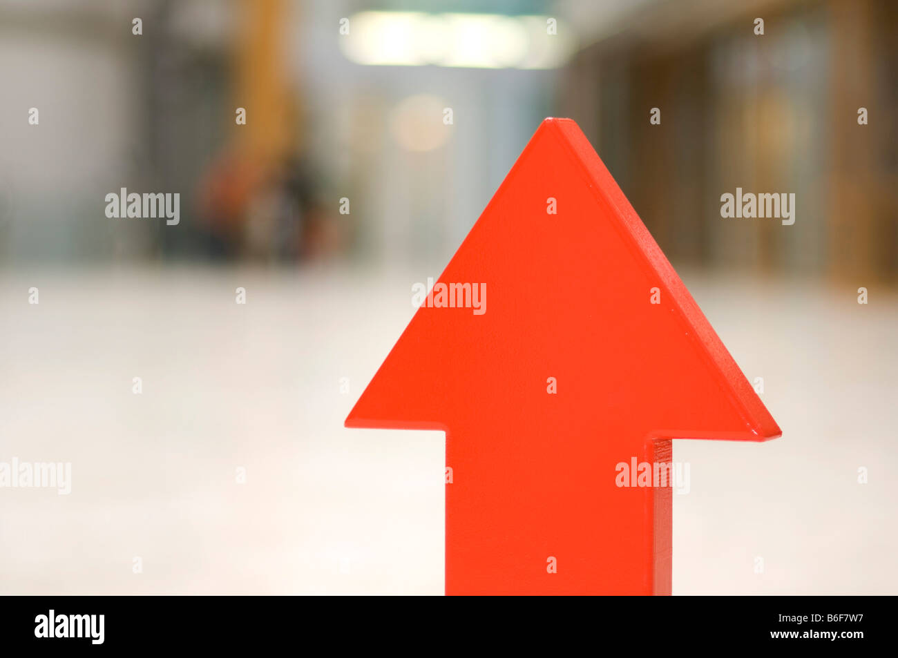 Red arrow pointing upwards Stock Photo - Alamy