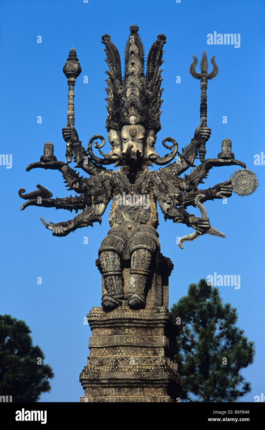 Concrete sculpture of a Three-Headed Ganesh, the elephant God, Buddhist ...