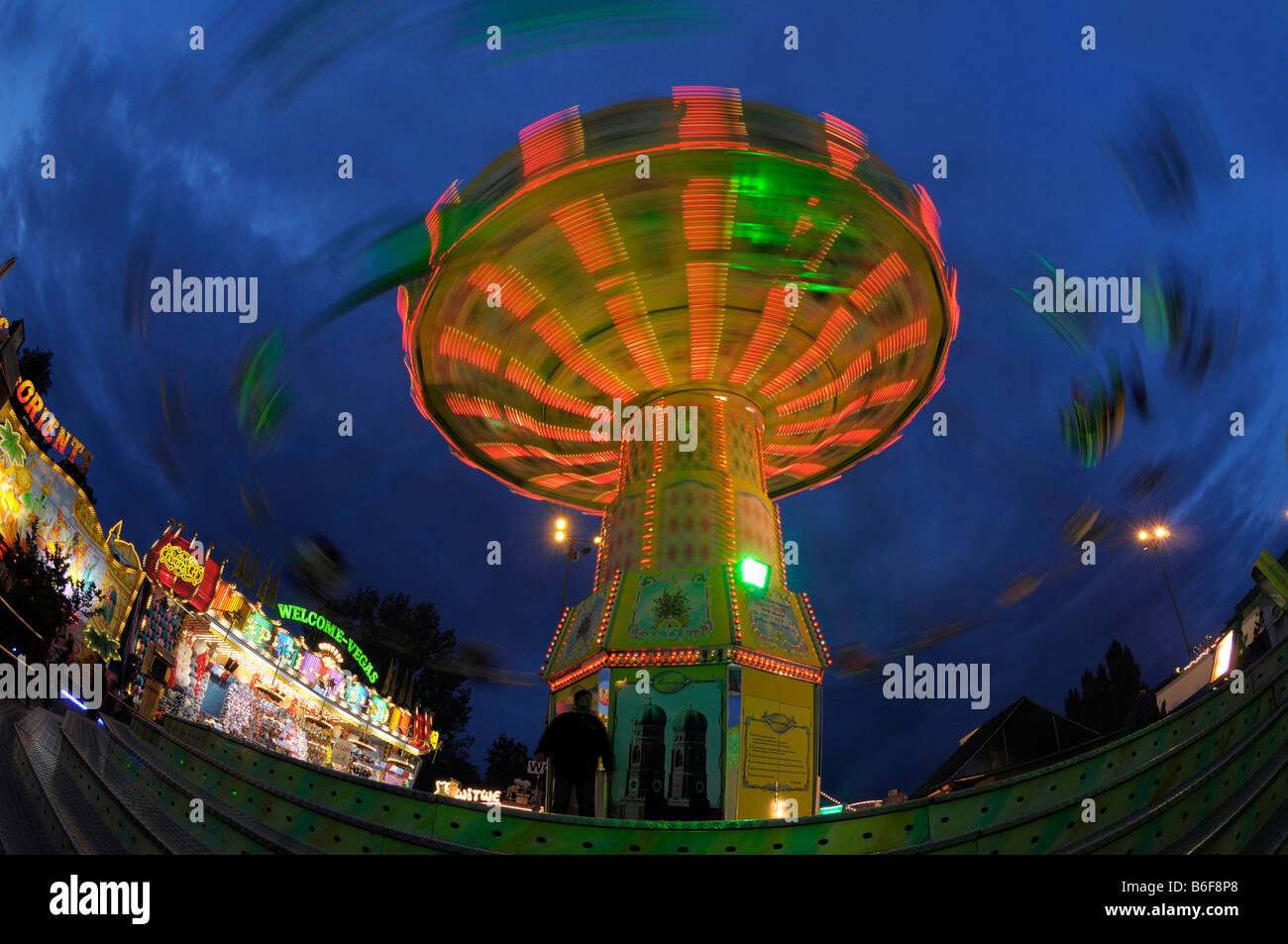 Swing carousel on a fairground Stock Photo - Alamy