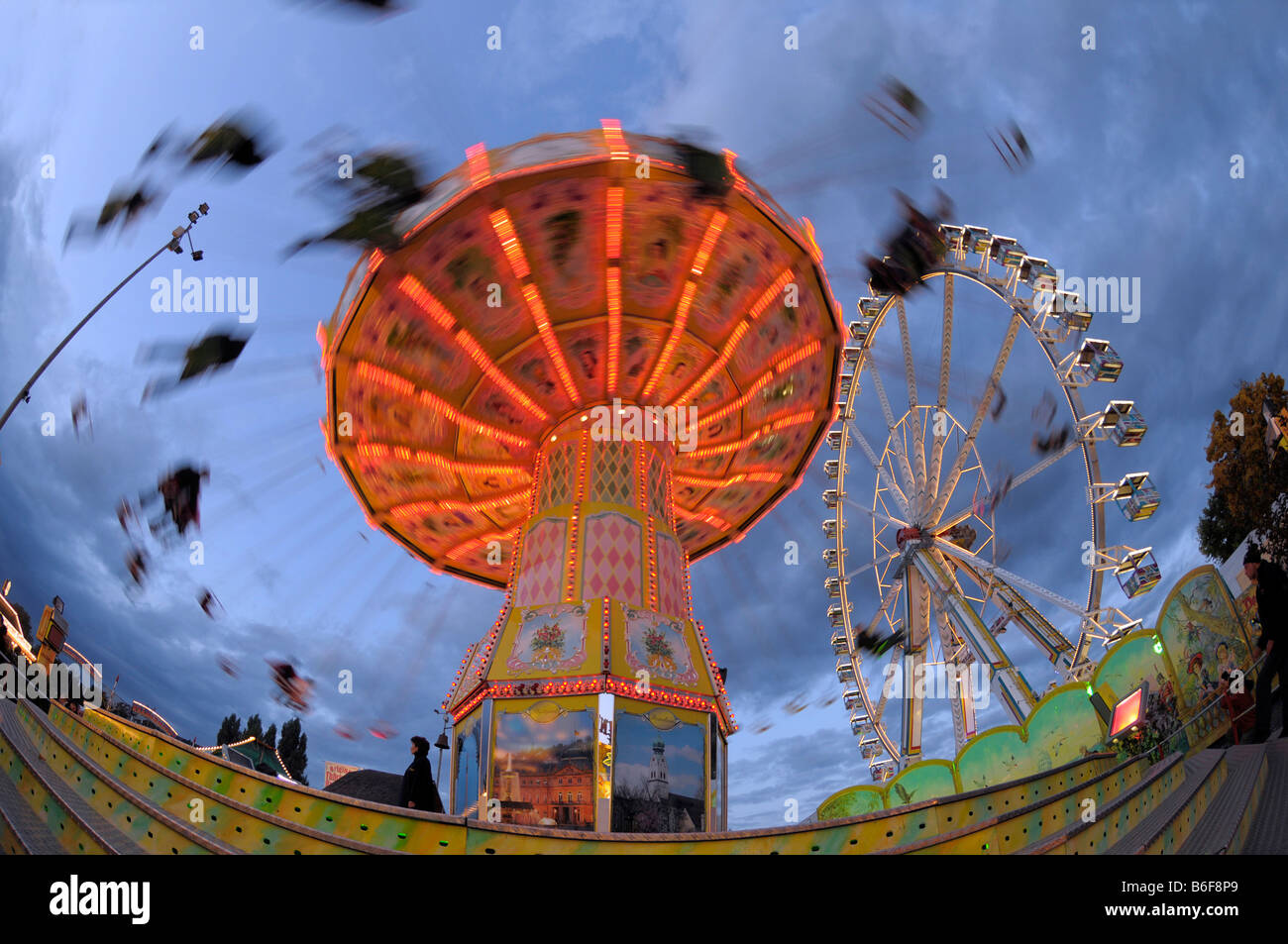Swing carousel on a fairground Stock Photo - Alamy
