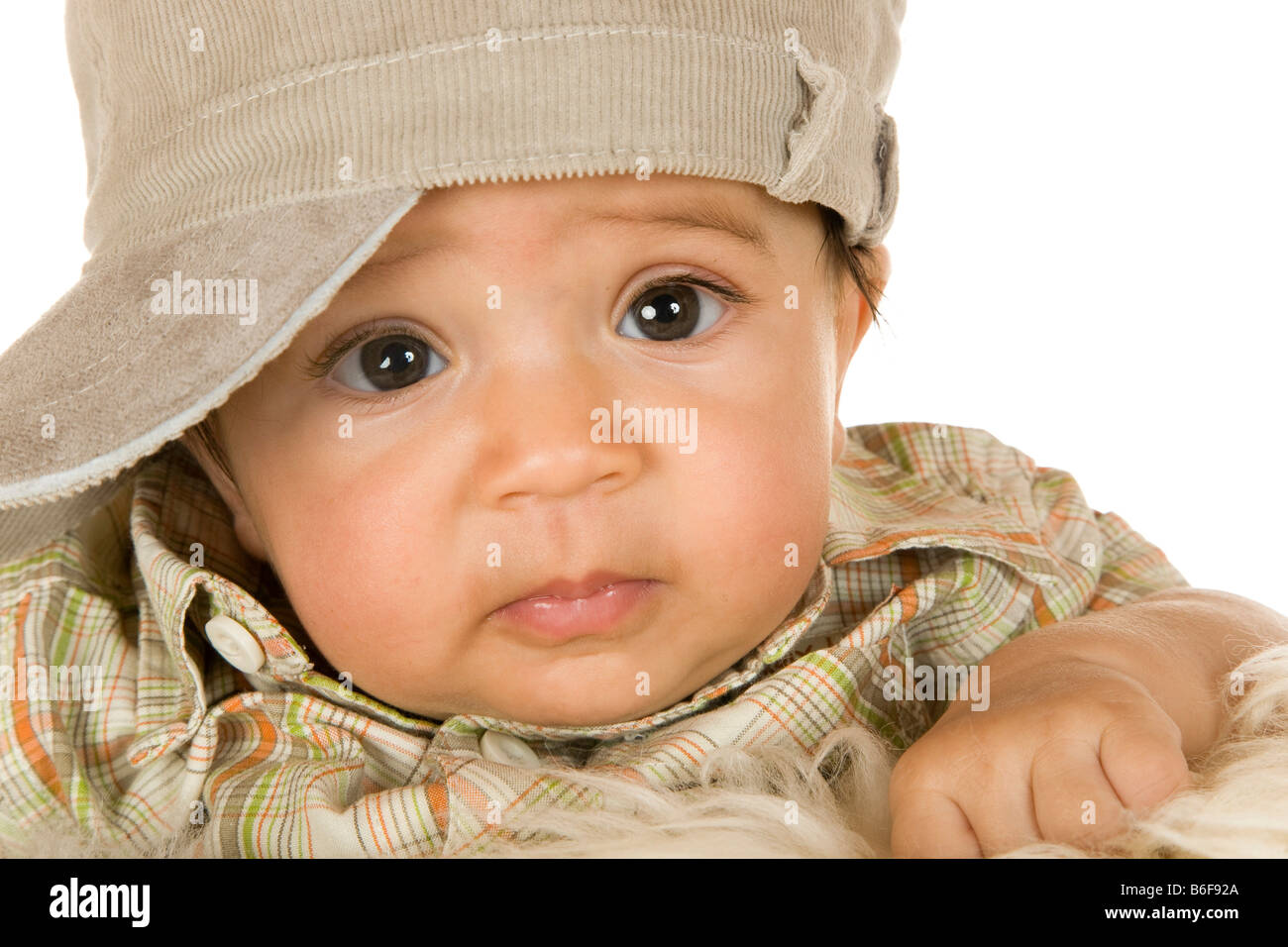 Baby, 4 month-old, looking ernest Stock Photo - Alamy