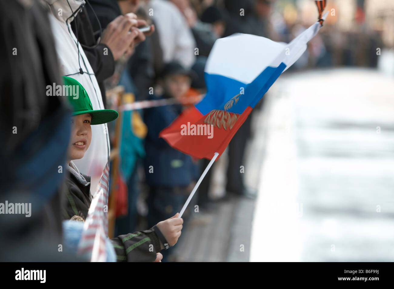 Crowds waving flags during Victory Day Celebration, Moscow Russia Stock ...